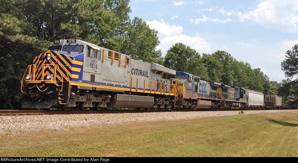 CREX ES44AC 1516 leads CSX C40-8Ws 7796 and 7906